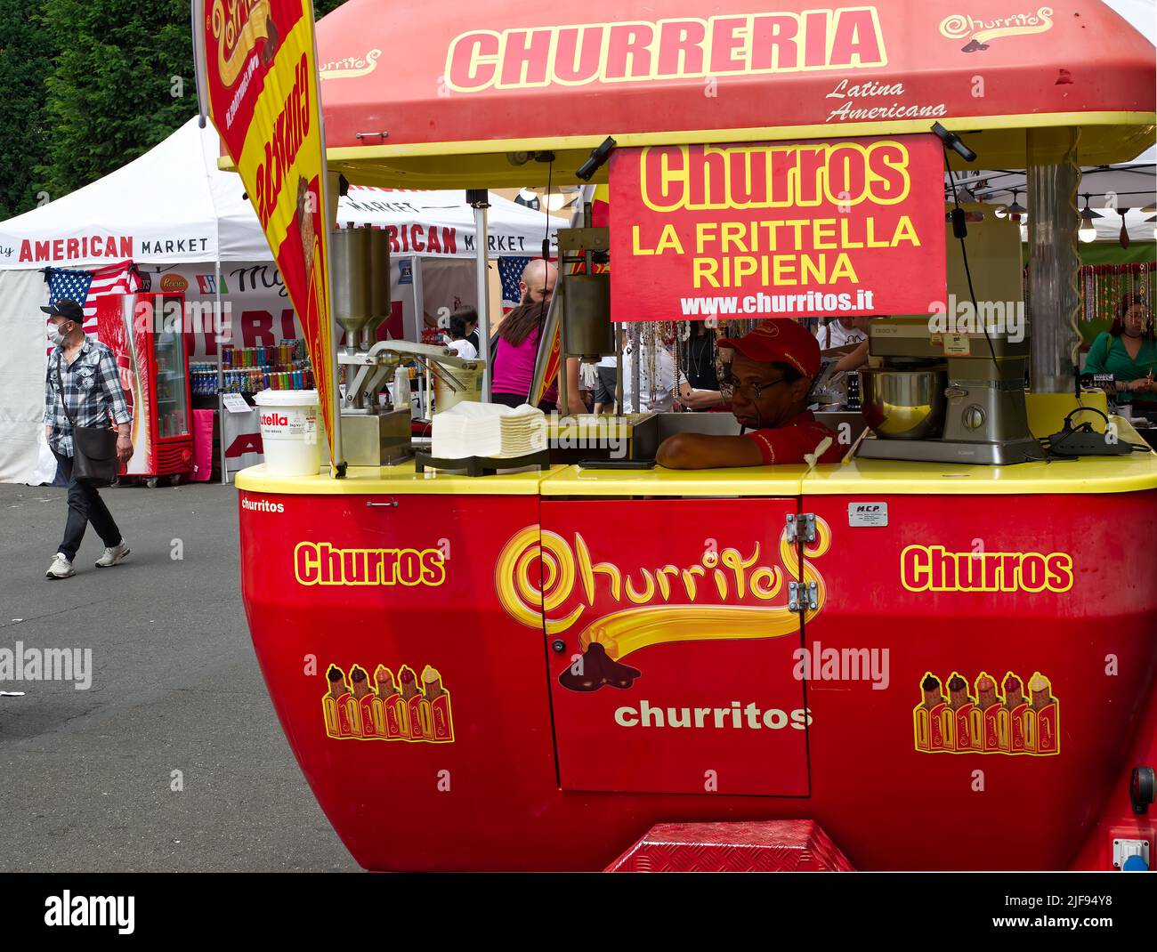 Sale of Churros at International Street Food Fair in Modena. Italy ...