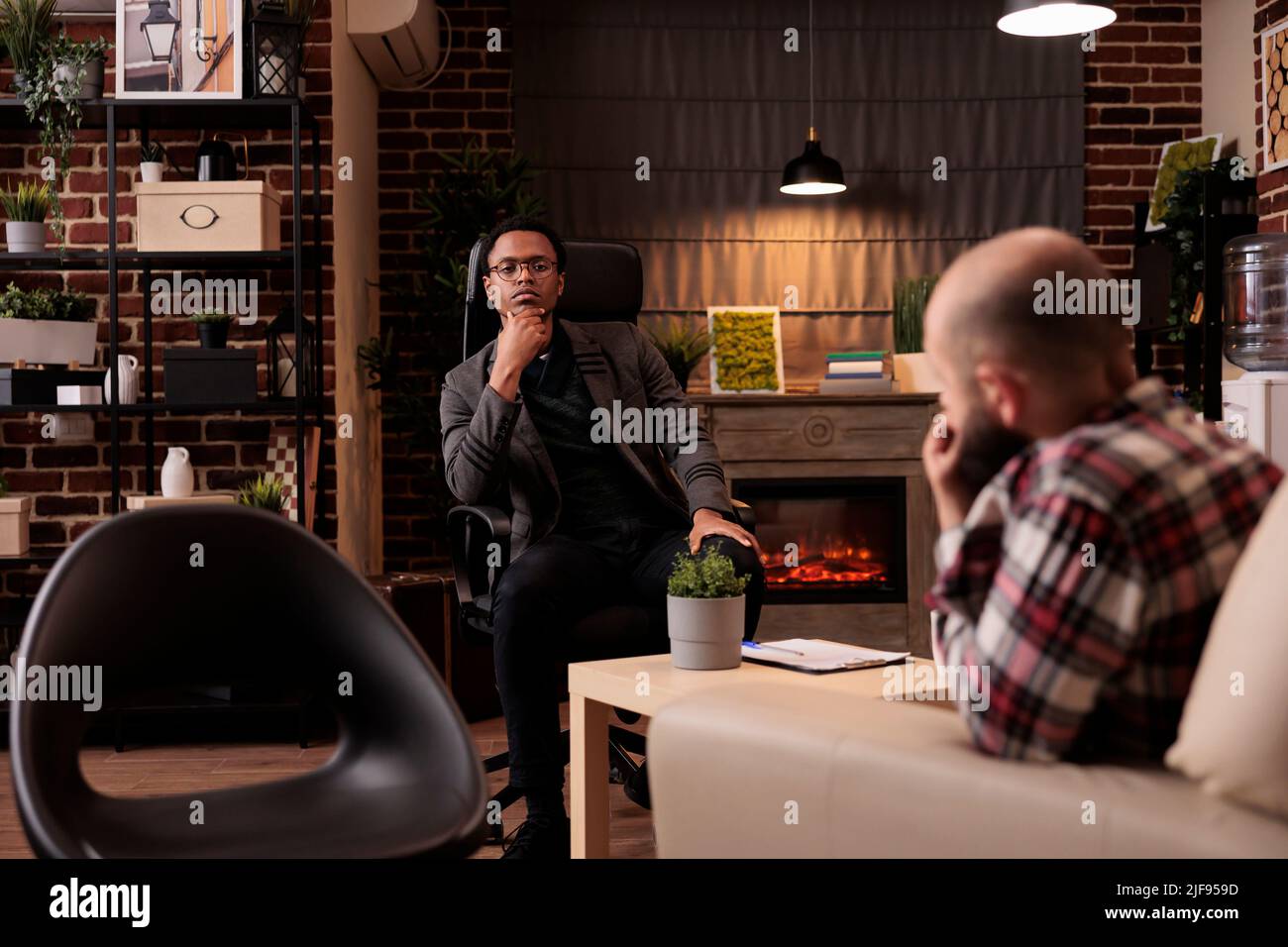 Female psychologist listening problems african hi-res stock photography ...