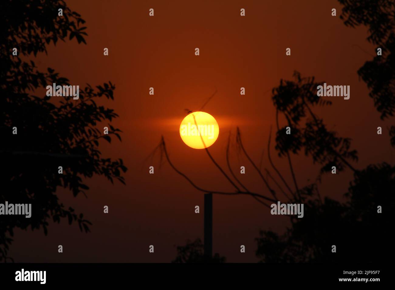 Gorgeous panorama scenic of the strong sunset with silver lining and ...