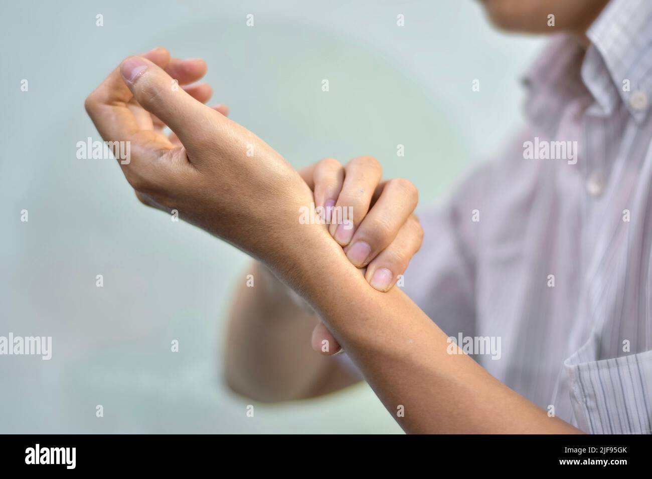 Self-examination of pulsation. Counting pulse rate in home Stock Photo ...