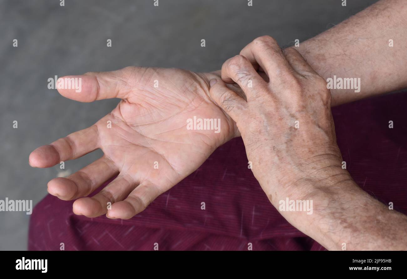 Self-examination of pulsation. Counting pulse rate in home Stock Photo ...