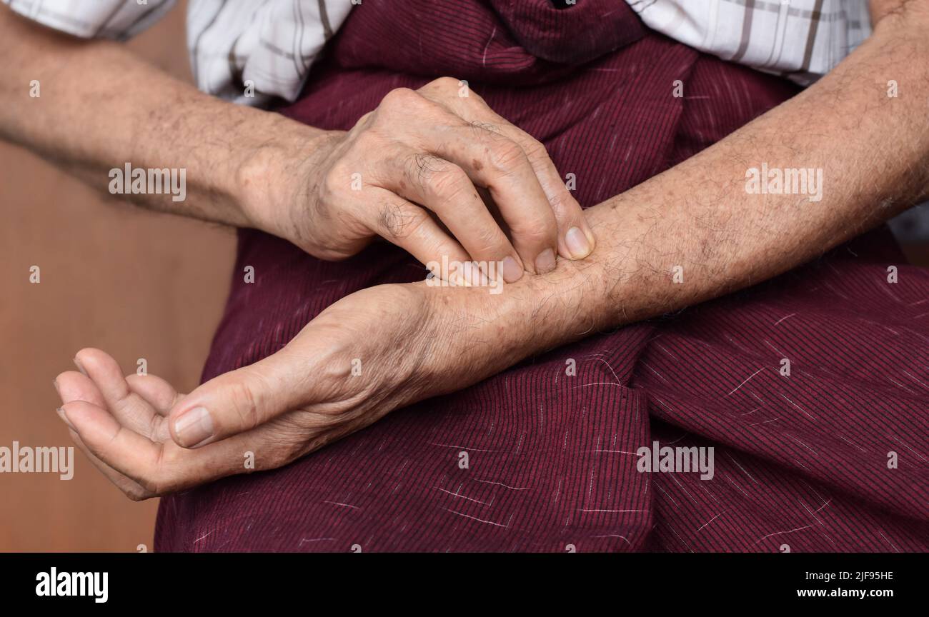 Self-examination of pulsation. Counting pulse rate in home Stock Photo ...