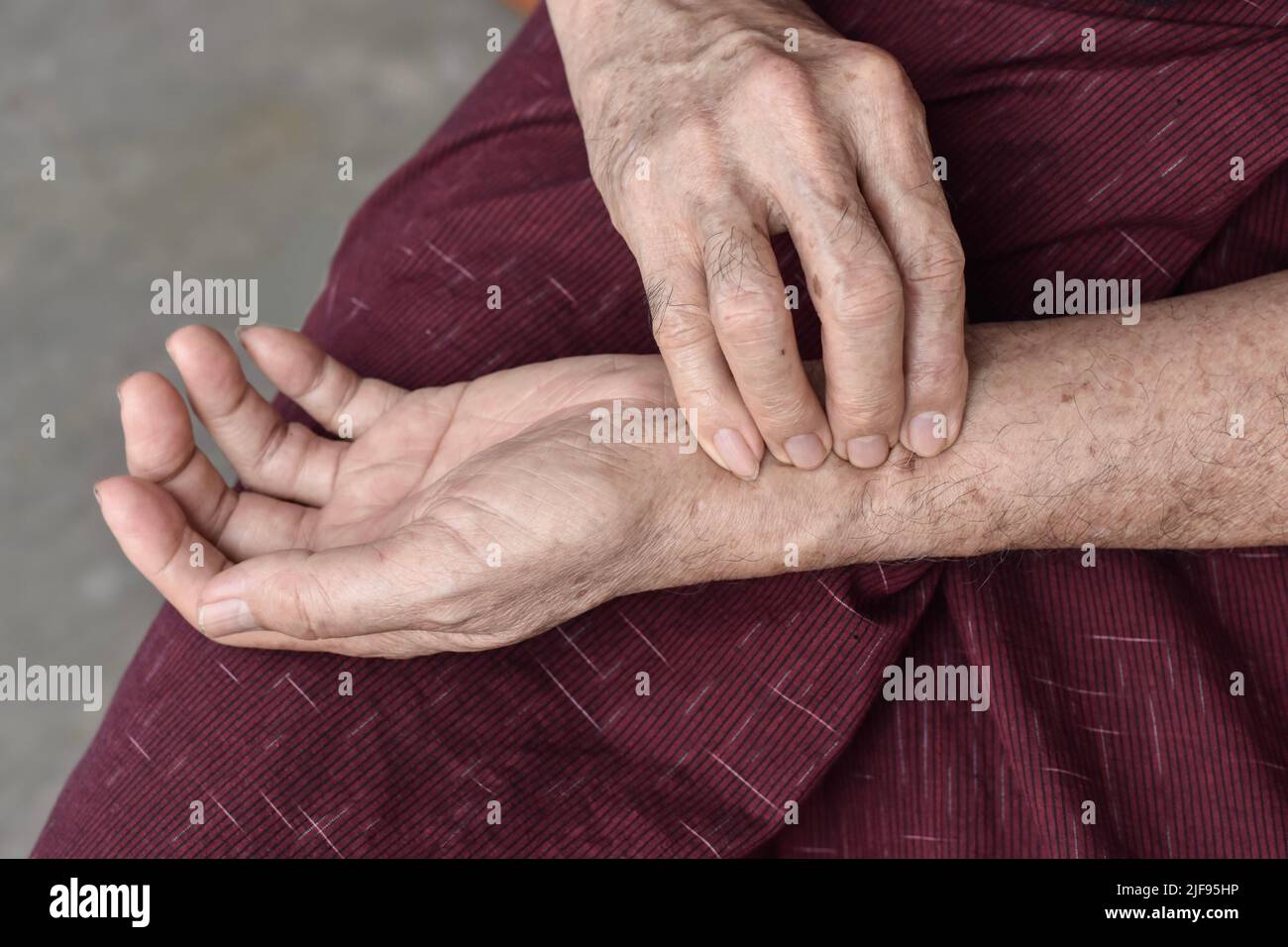 Self-examination of pulsation. Counting pulse rate in home Stock Photo ...