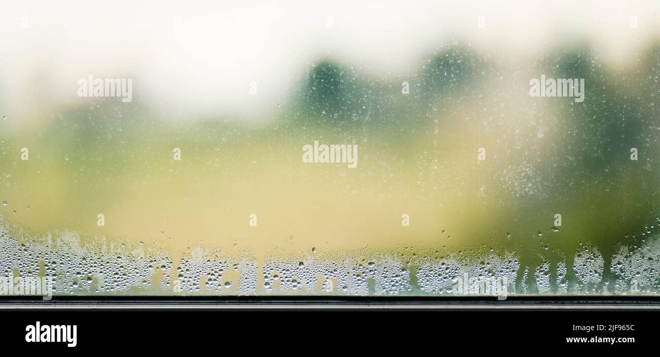 Condensation on the window glass, blur on background Stock Photo - Alamy