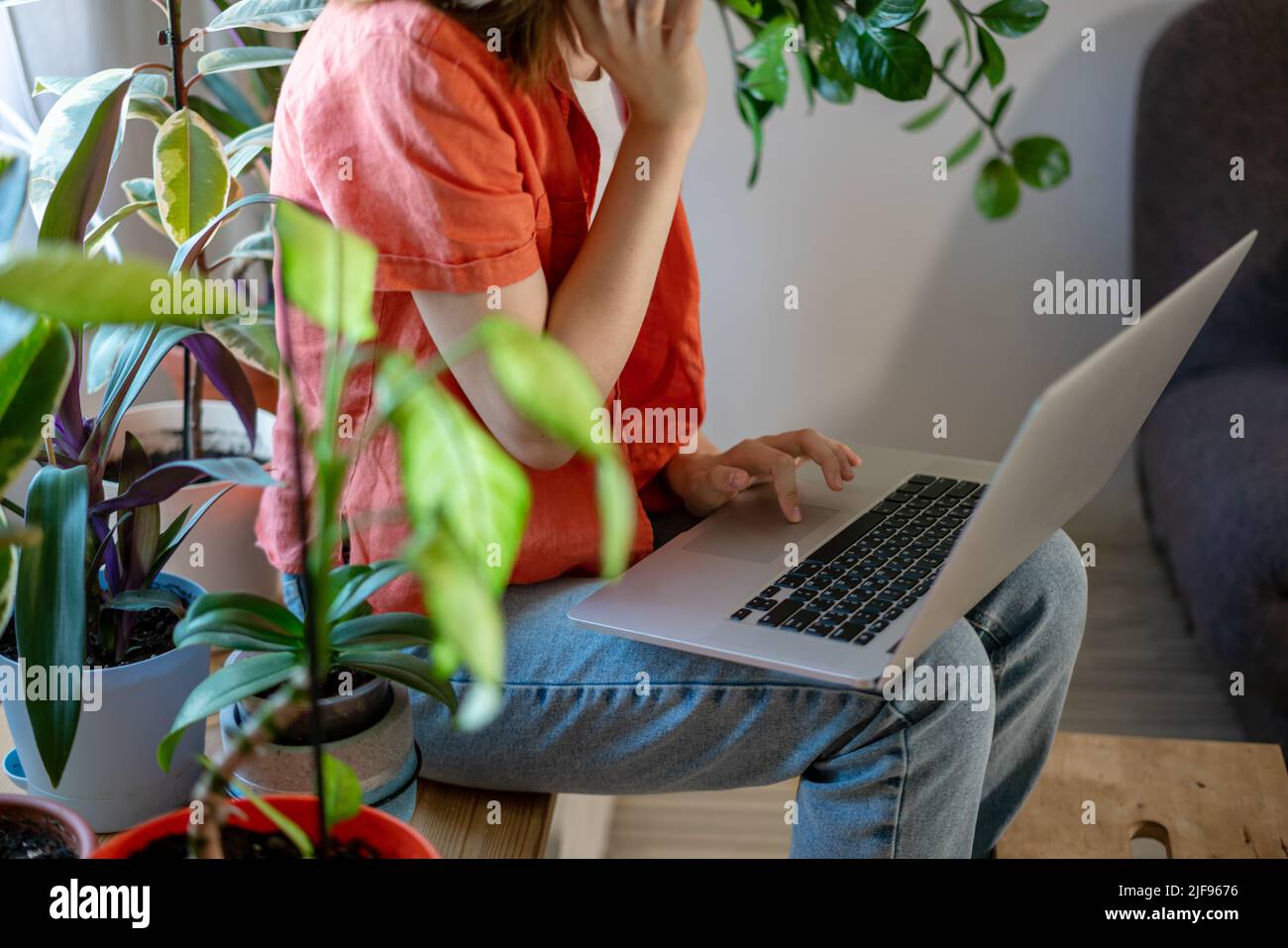 Happy caucasian teen high school student studying with laptop notebook ...