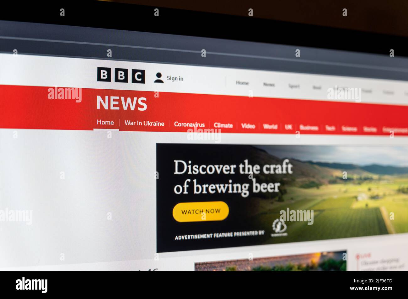 BBC News webpage on PC screen. BBC News is operational division ...