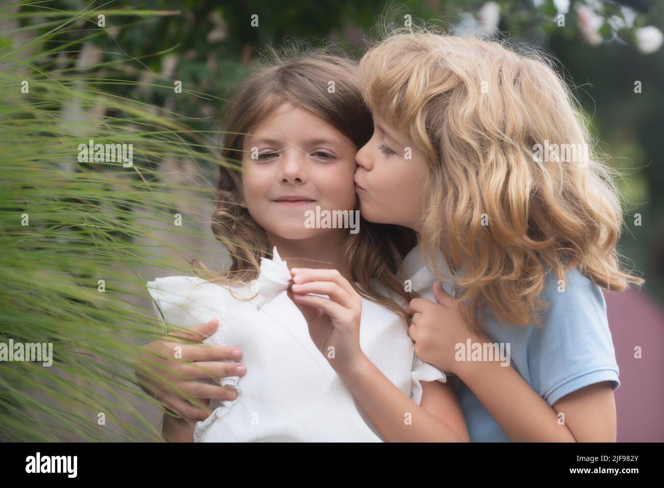 Kids Kissing On Cheek