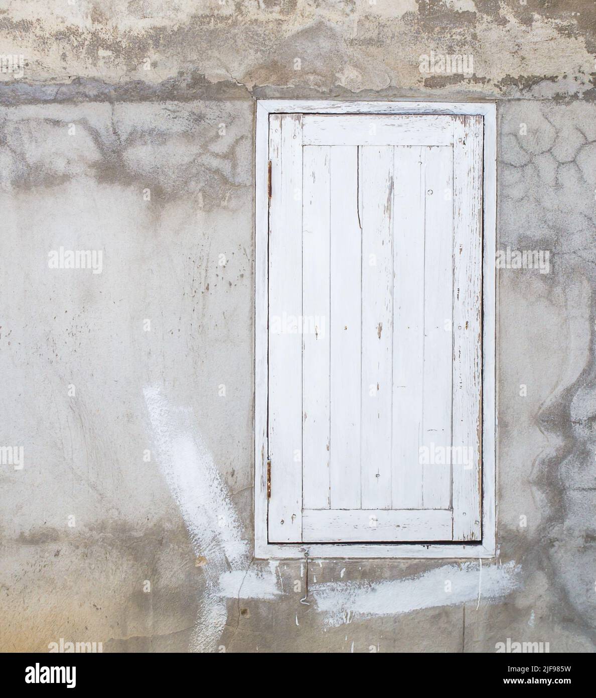 Vintage white window on grunge cement background Stock Photo - Alamy