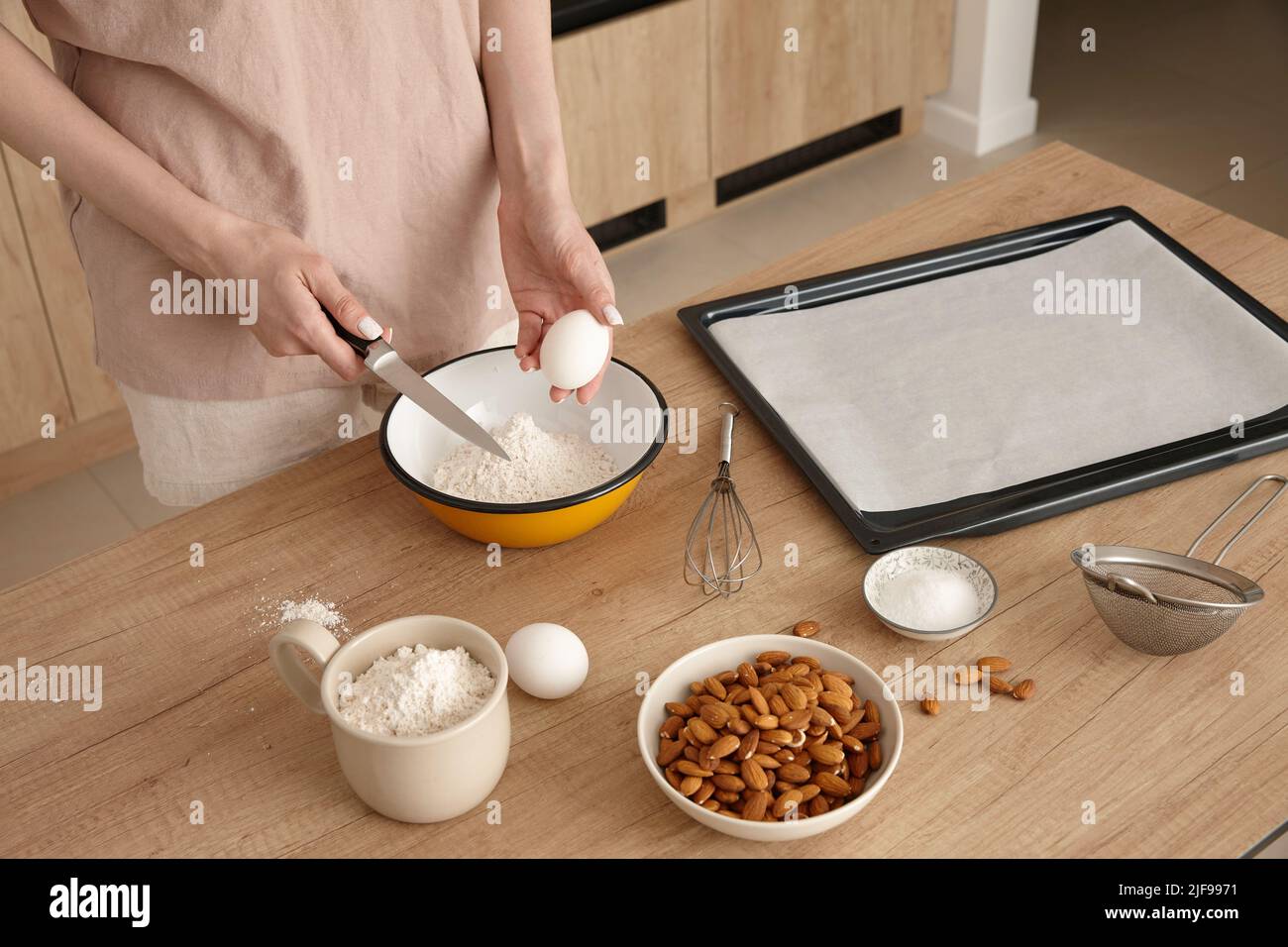 Woman cooking in modern loft-style kitchen, close up view Stock Photo ...