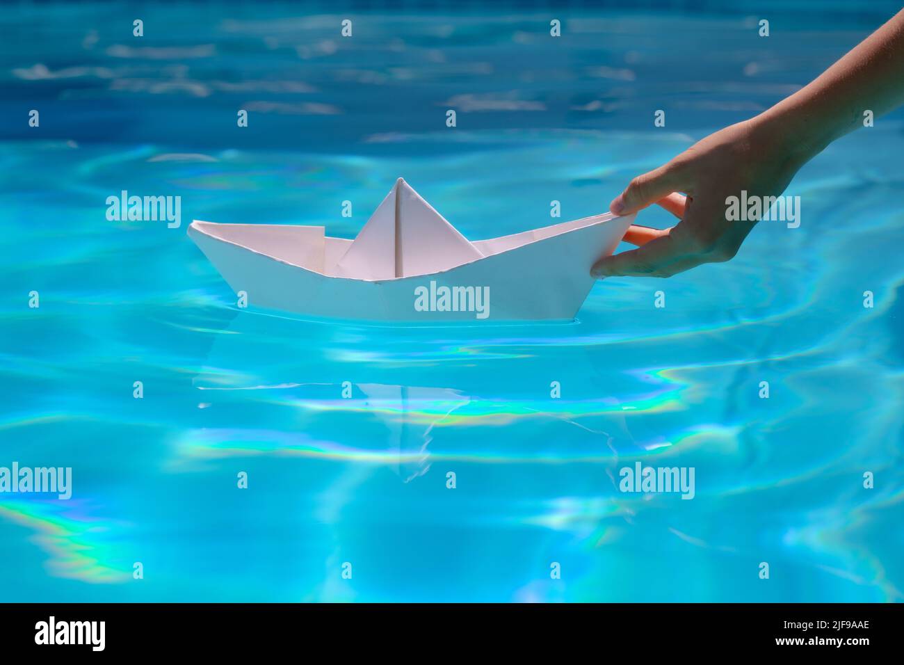 Paper ship and ocean water. Paper boat sailing on sea water with waves ...
