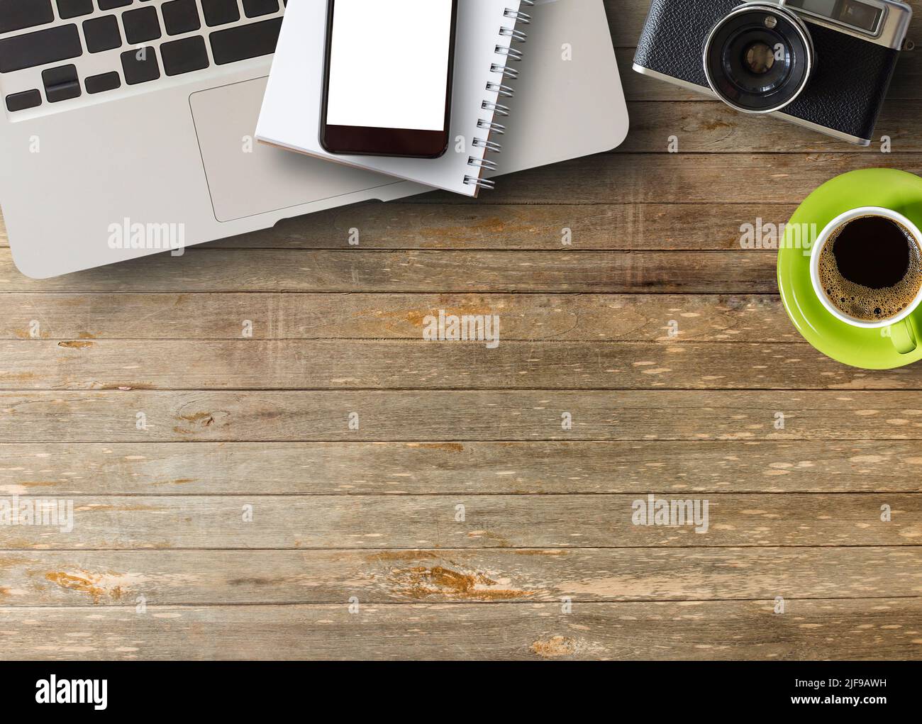 Blank paper notebook with laptop computer and cup of coffee on wooden ...