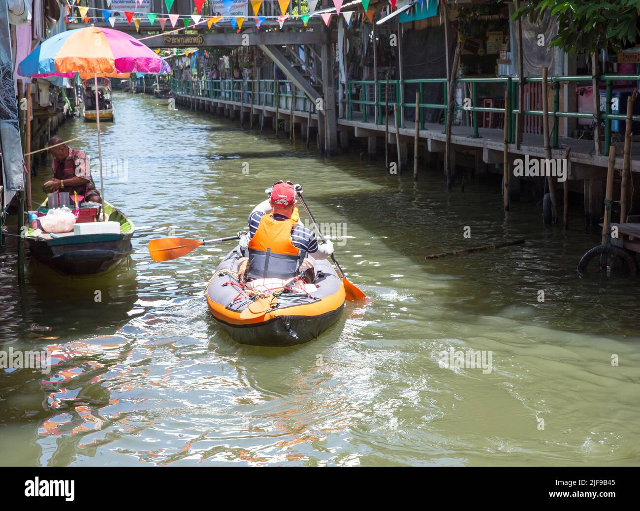 Bangkok / Thailand - June 19 2022: The foreigner exercise with canoe ...