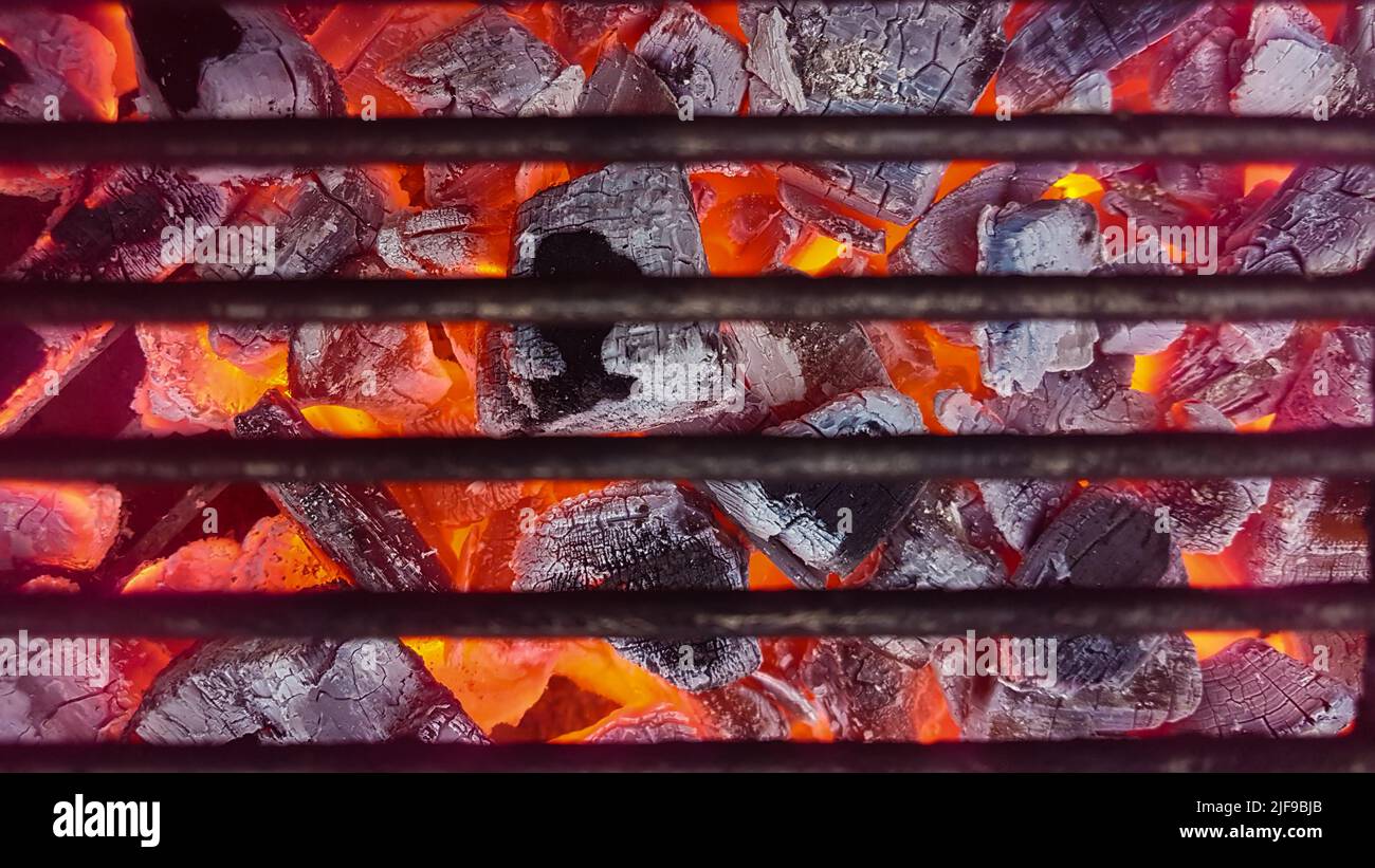 Hot red coals texture. Burning charcoal background. Close-up of hot ...