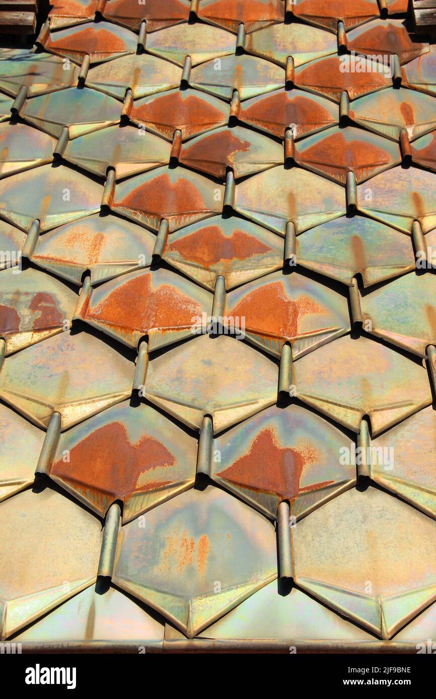 Roof covering made of galvanized steel. Colorful copper tile made of ...