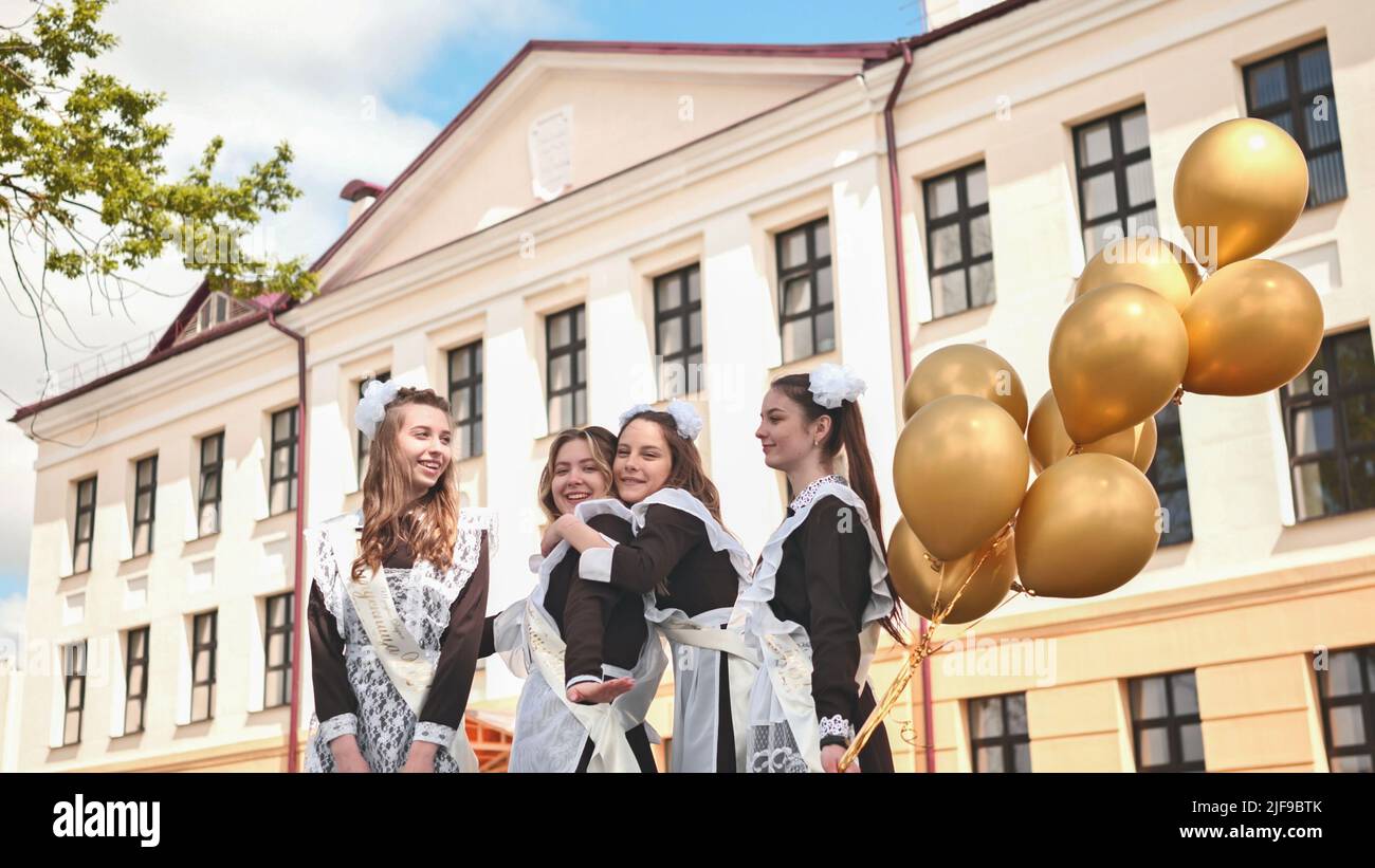 Happy Russian female graduates pose on their graduation day Stock Photo ...