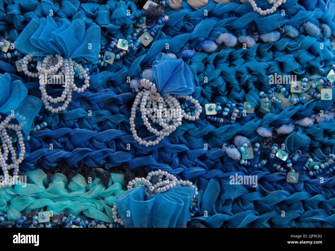 Complex embroidery background. Patchwork. Handmade background. Beads ...