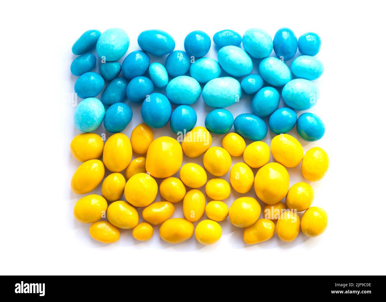 Candy in blue and yellow colors of Ukrainian flag. Stand with Ukraine ...