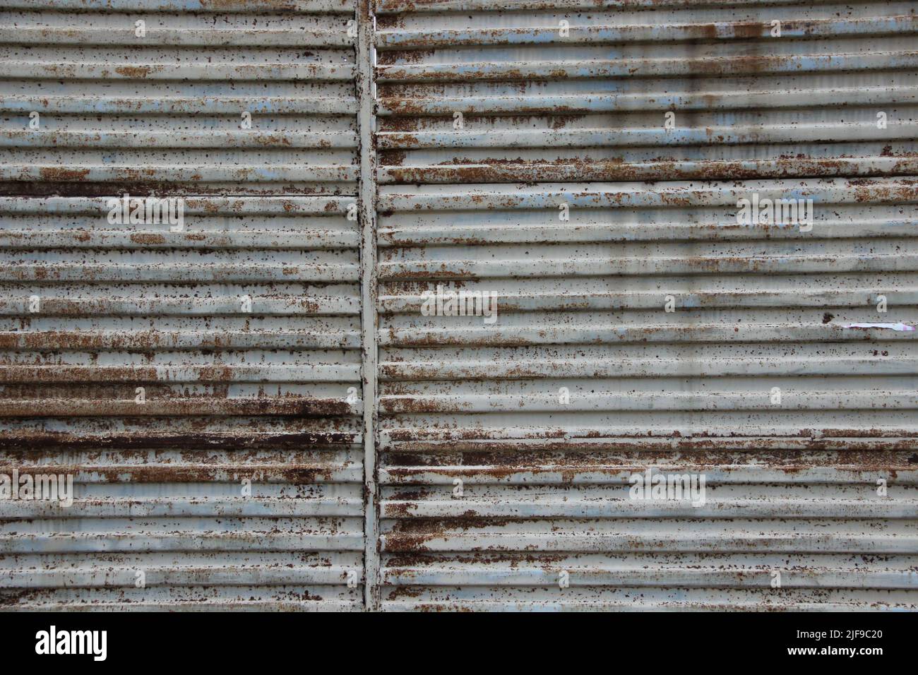 Old metal sheet texture. Rusted fence with welding Stock Photo - Alamy