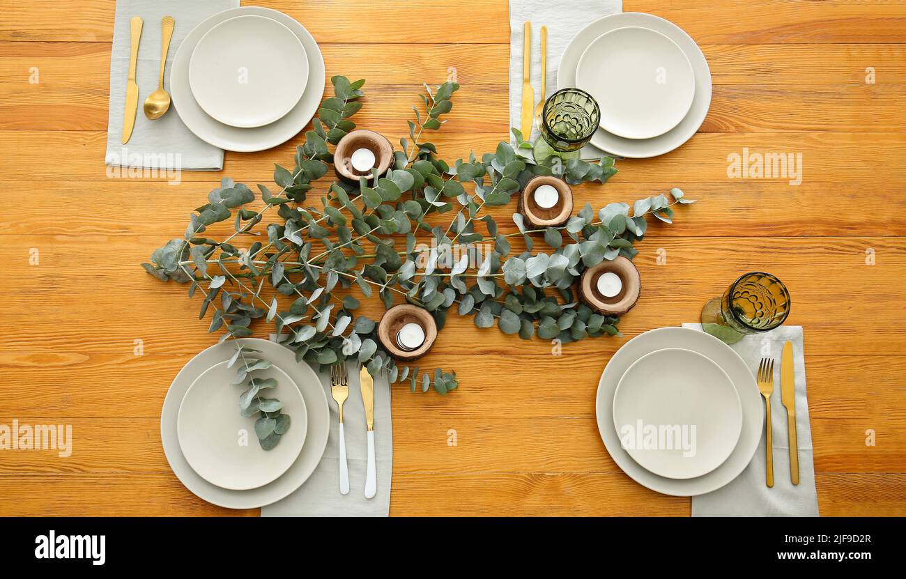 Beautiful table setting with floral decor, top view Stock Photo - Alamy