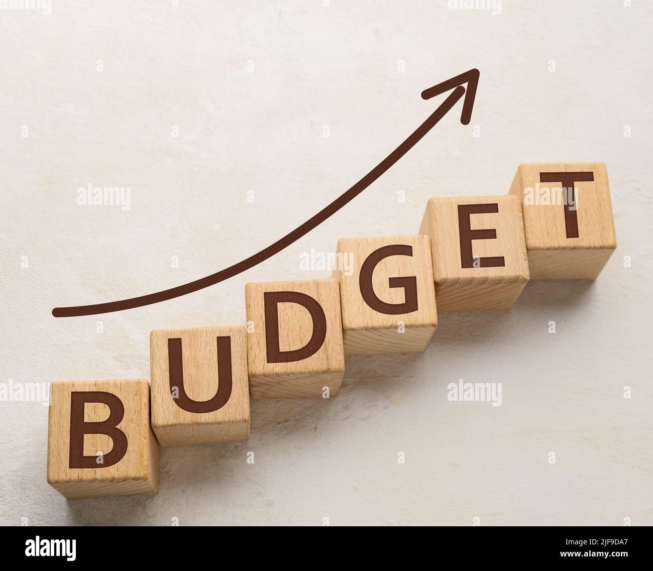Word BUDGET made of cubes and arrow on light background. Budget ...