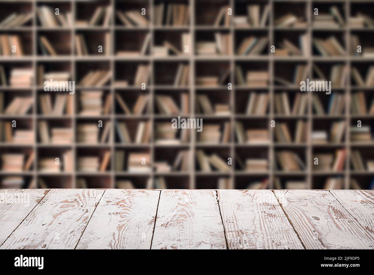 Empty wooden table in modern library Stock Photo - Alamy
