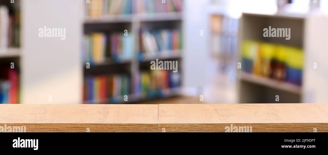 Empty table in modern library Stock Photo - Alamy