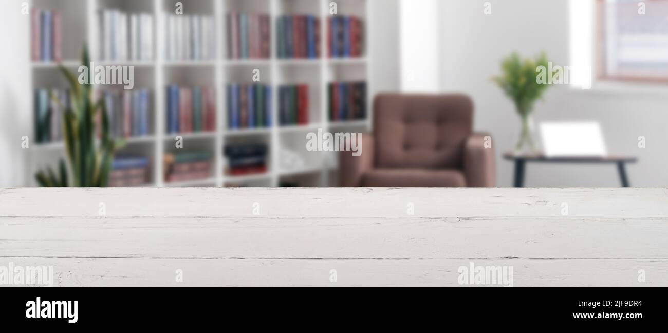 Empty table in modern home library Stock Photo - Alamy