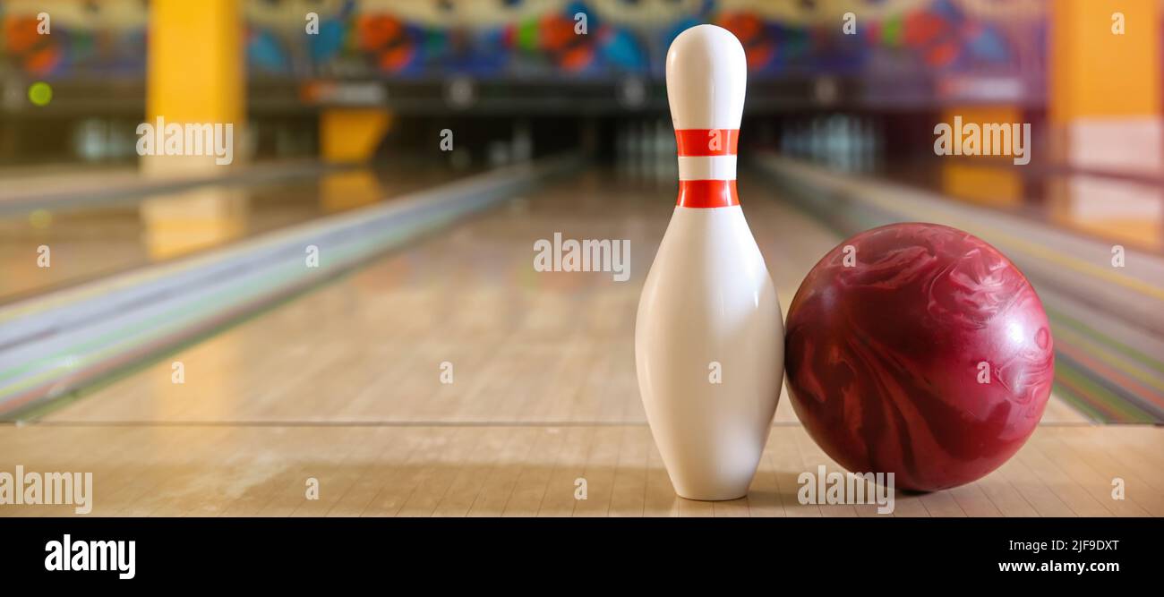 Ball and pin on floor in bowling club Stock Photo - Alamy