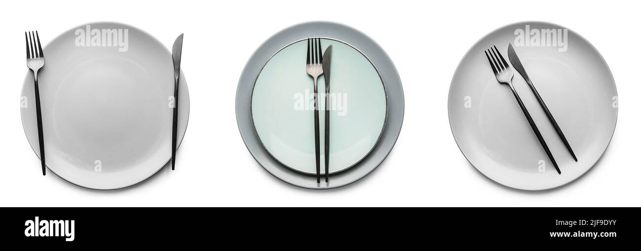 Set of stylish table settings on white background, top view Stock Photo ...