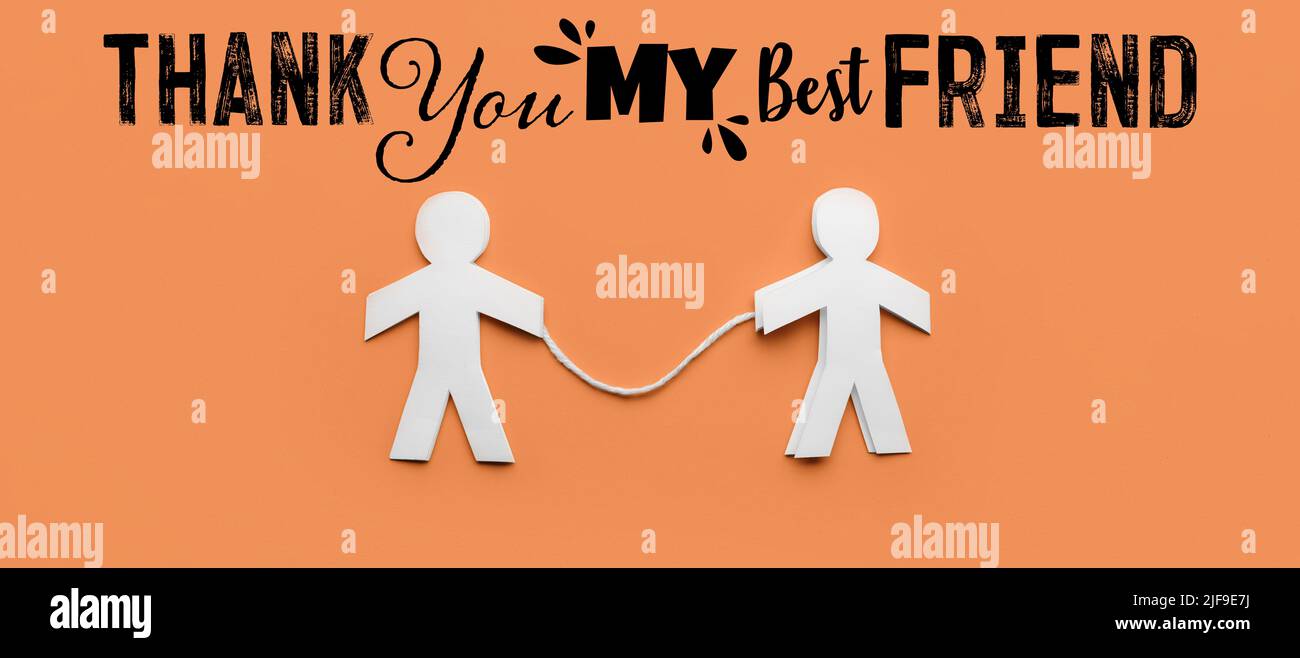Paper human figures and text THANK YOU MY BEST FRIEND on orange ...