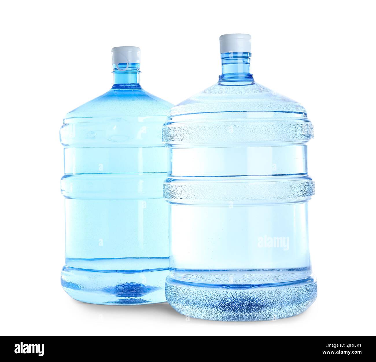 Bottles of clean water isolated on white Stock Photo - Alamy