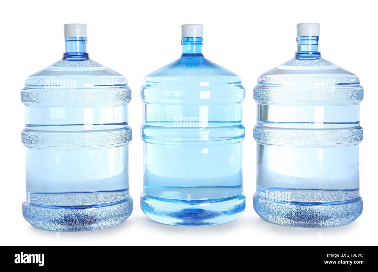 Bottles of clean water isolated on white Stock Photo - Alamy