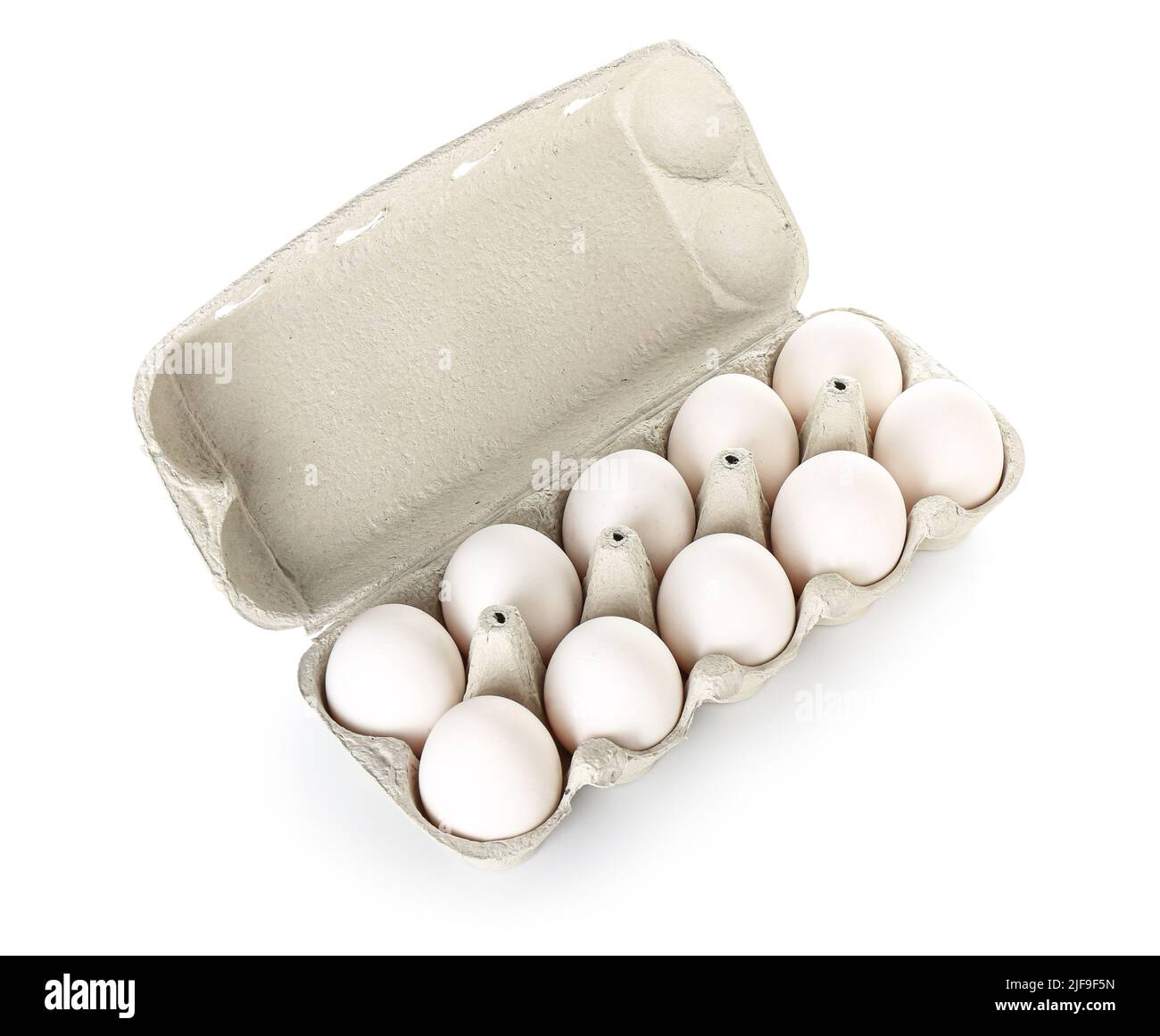 Open holder with chicken eggs isolated on white background Stock Photo ...