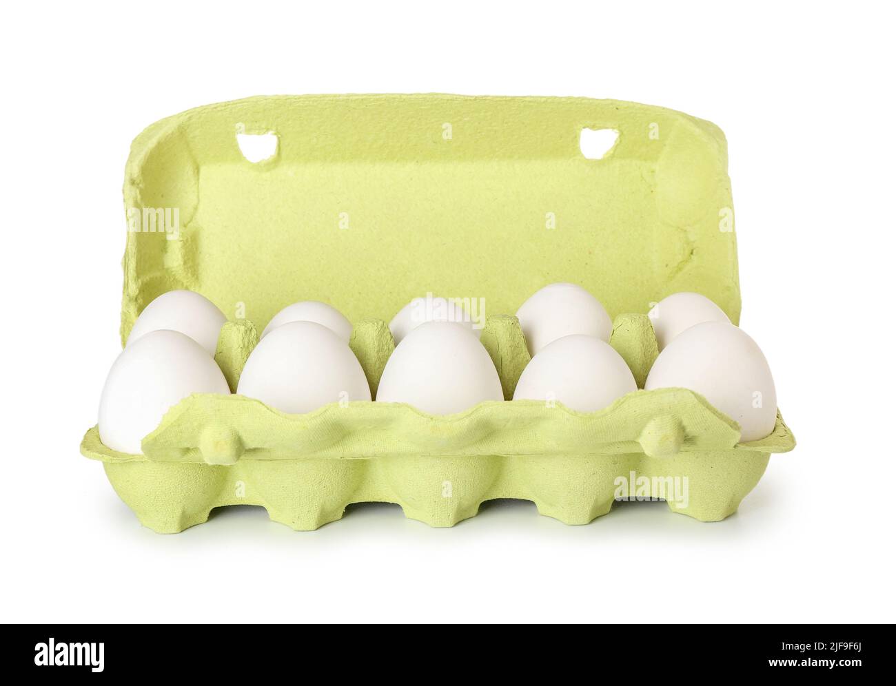 Open holder with chicken eggs isolated on white background Stock Photo ...