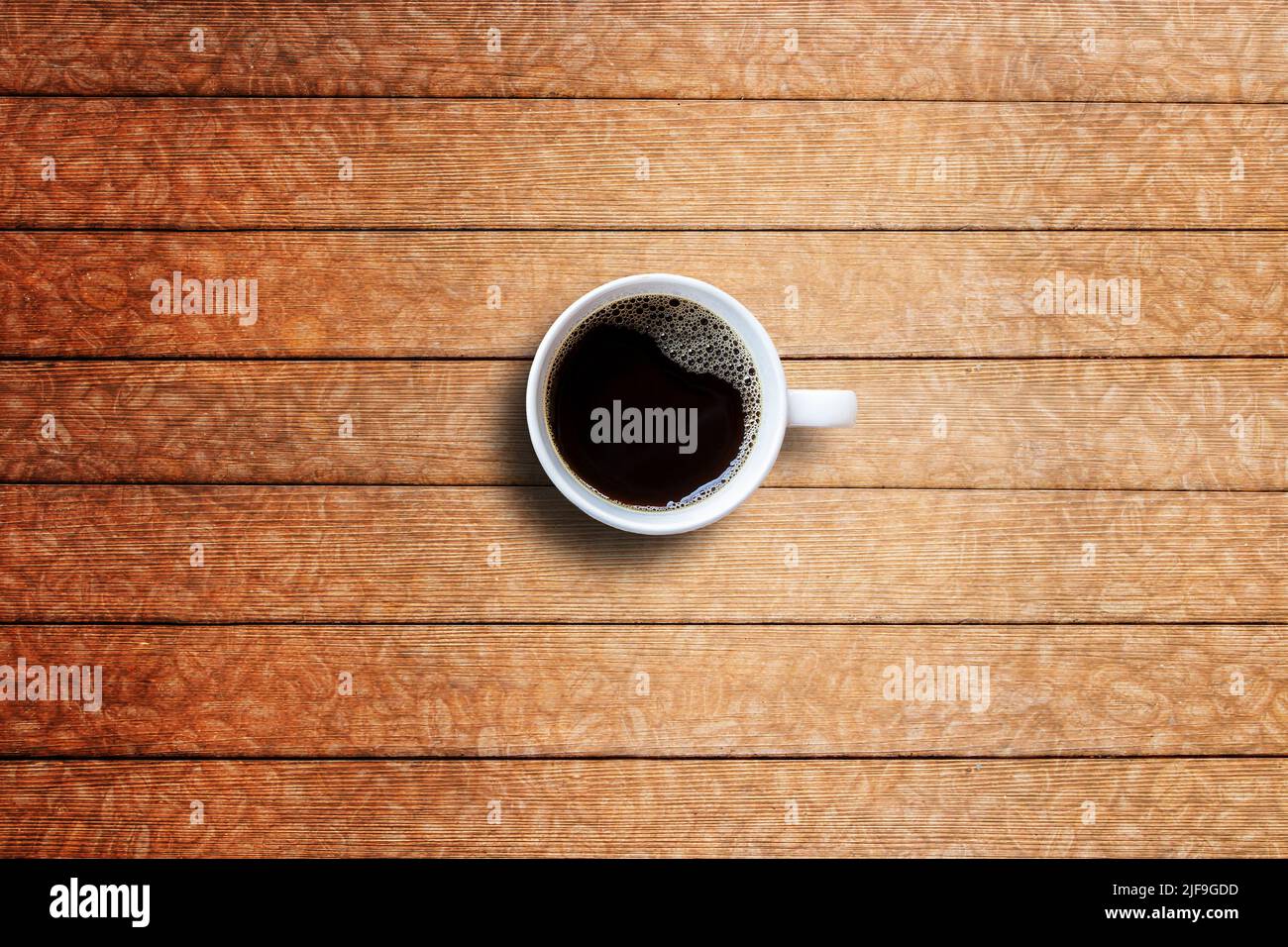 Cup of coffee on wood table background with copy space for any design ...