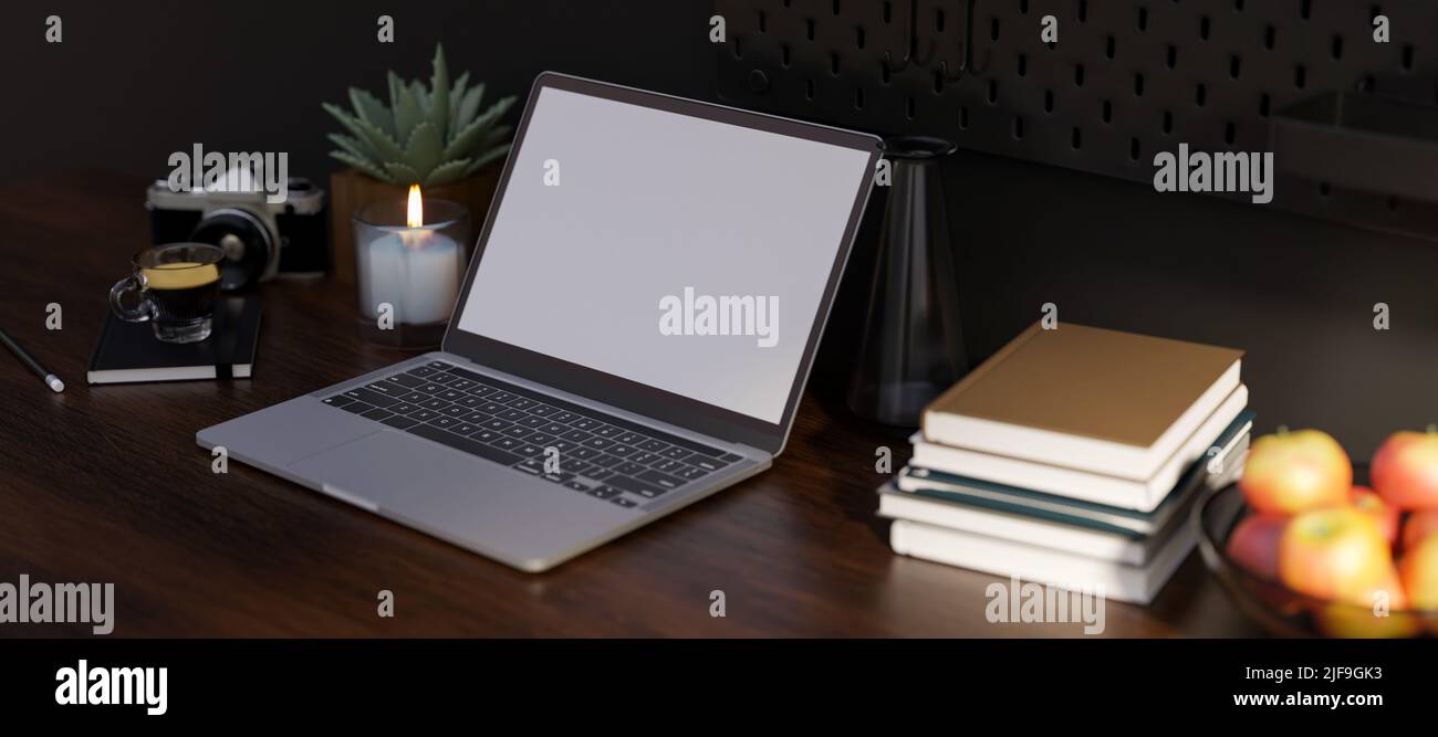 Close-up image, Portable notebook laptop white screen mockup, stack of ...