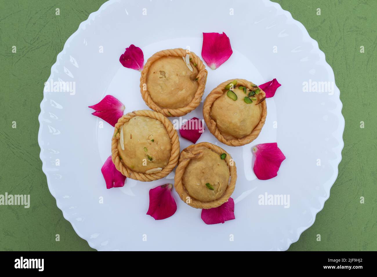 Top view of Popular Indian mithai or sweets known as chandrakal. round ...