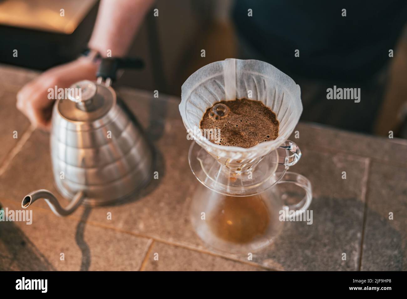 Hand drip coffee barista pouring hi-res stock photography and images ...