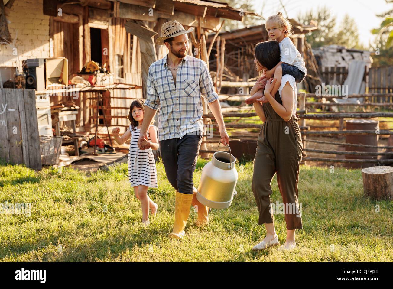 Happy young family enjoy spending time together on weekend at the ...