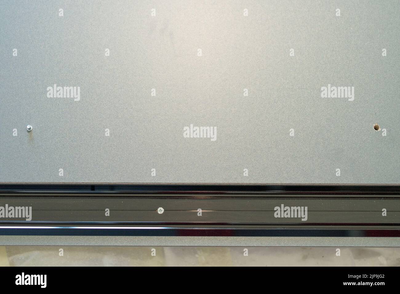 Fastening to a case of sliding accessories for doors of a sliding ...