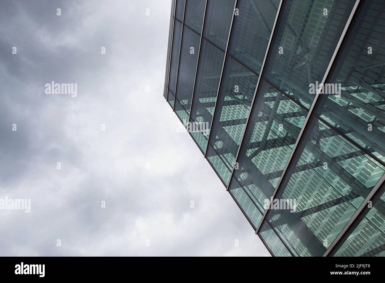 Modern building and cloudy sky in the city Stock Photo - Alamy