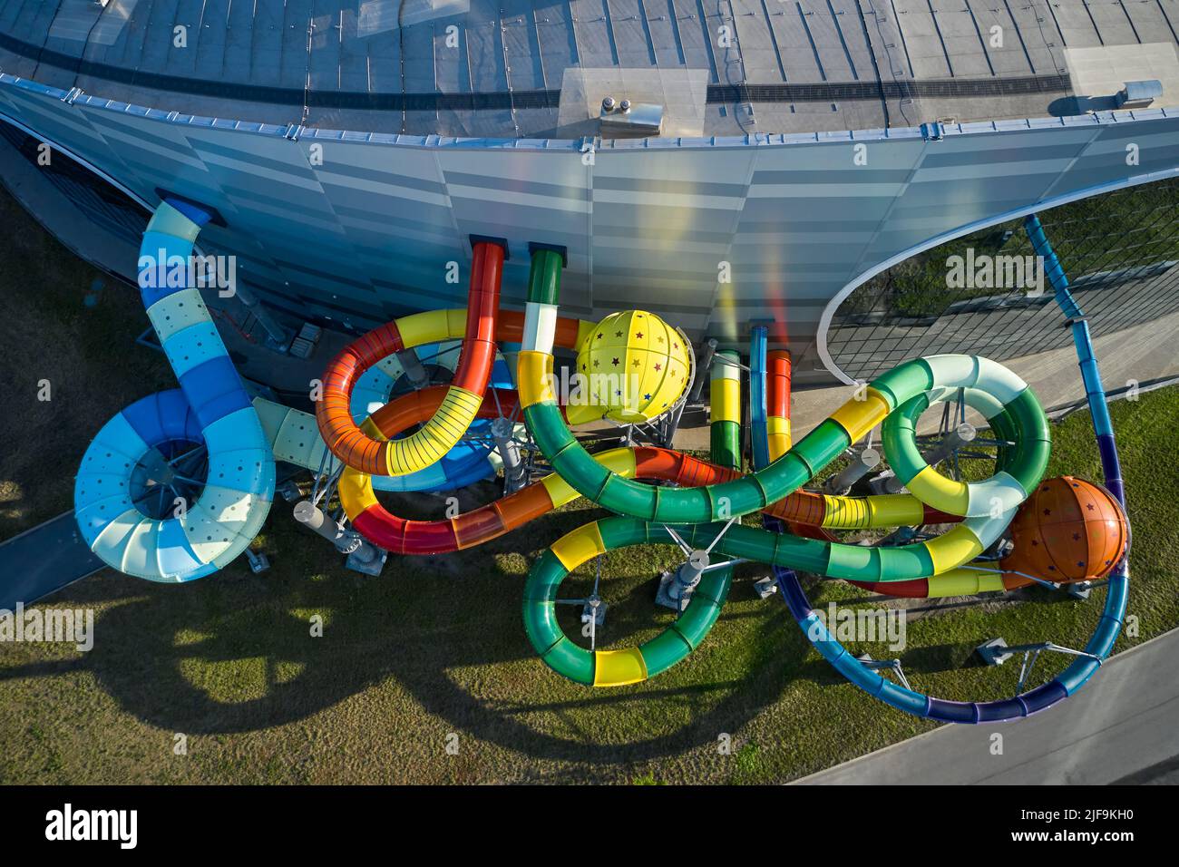 External water slides from water park building, top aerial view Stock ...