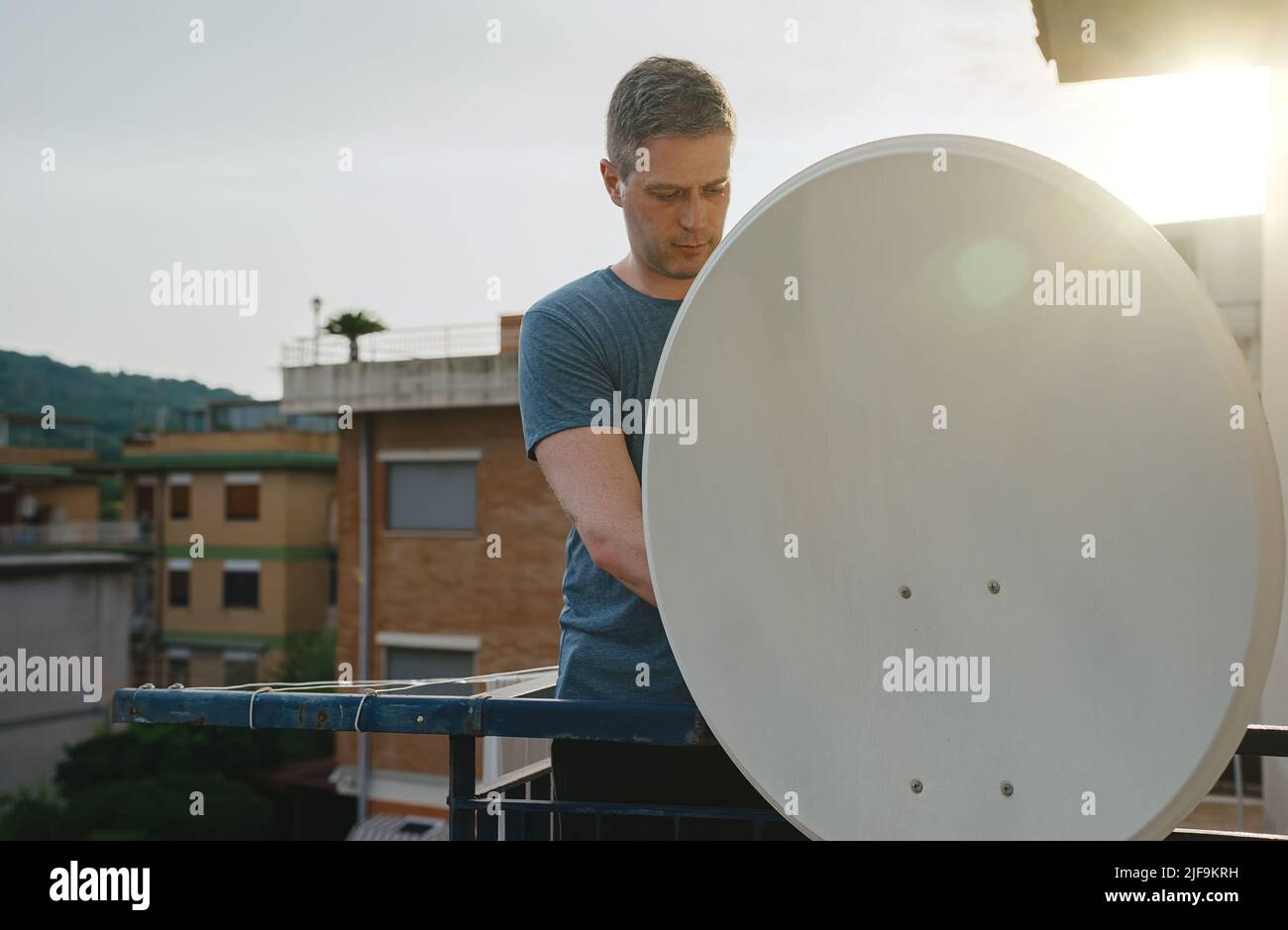 Installing satellite dish hi-res stock photography and images - Alamy