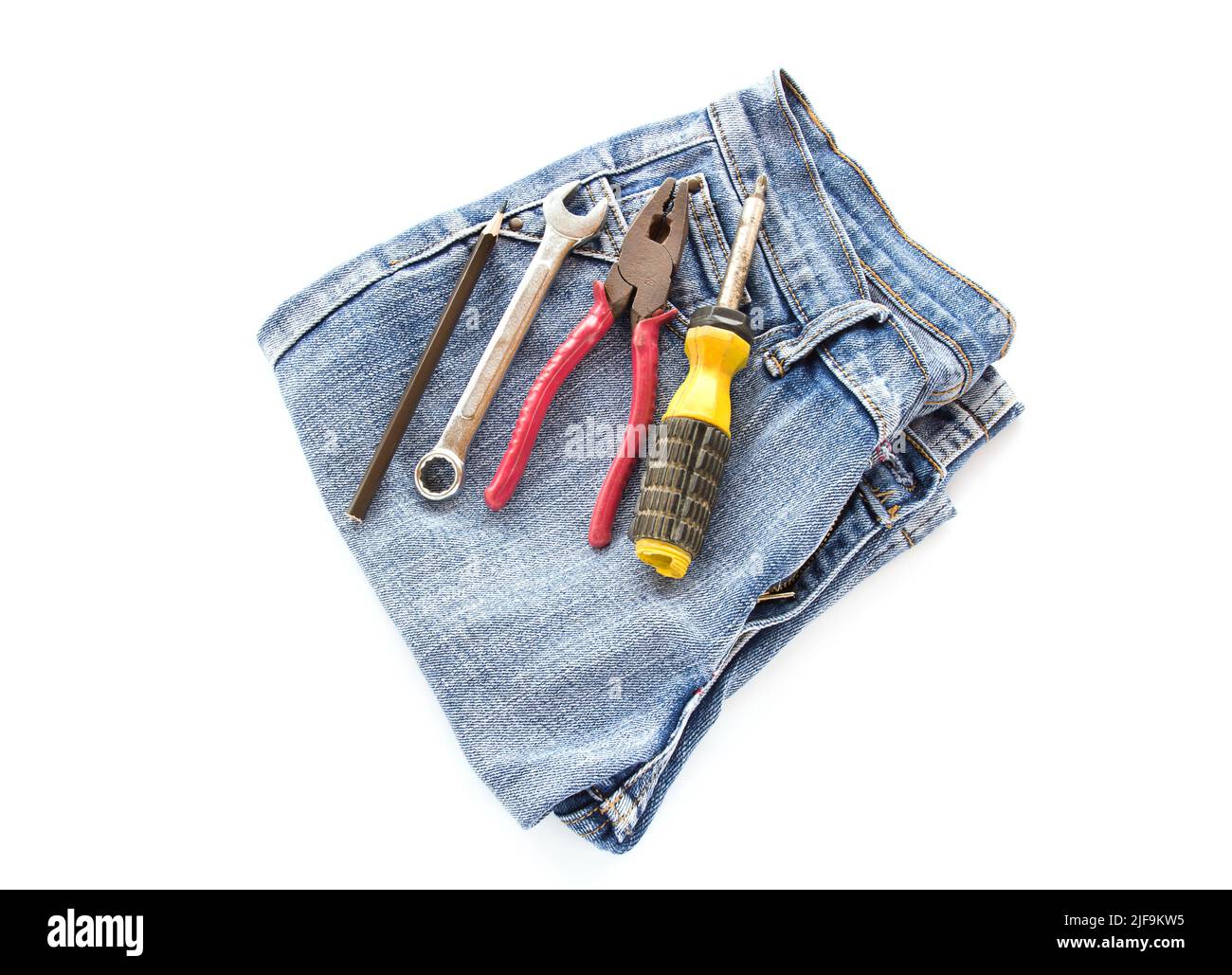 Blue jean and tools on a white background Stock Photo - Alamy