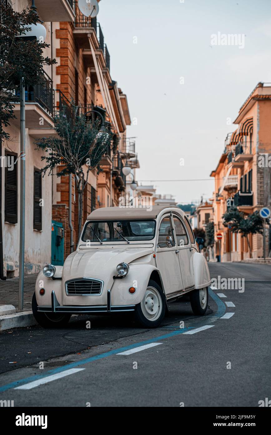 Typical italian street with old car in Scauri, Italy Stock Photo - Alamy