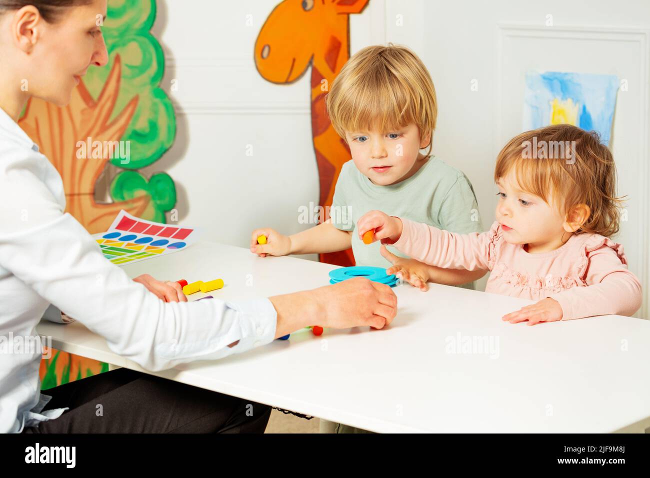 Child teacher table puzzle hi-res stock photography and images - Alamy