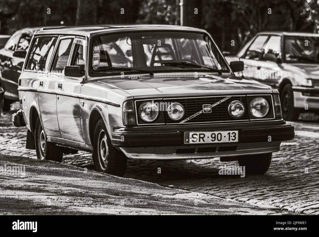 Old and classic blue car parked in the street. Volvo 245 DL Stock Photo ...