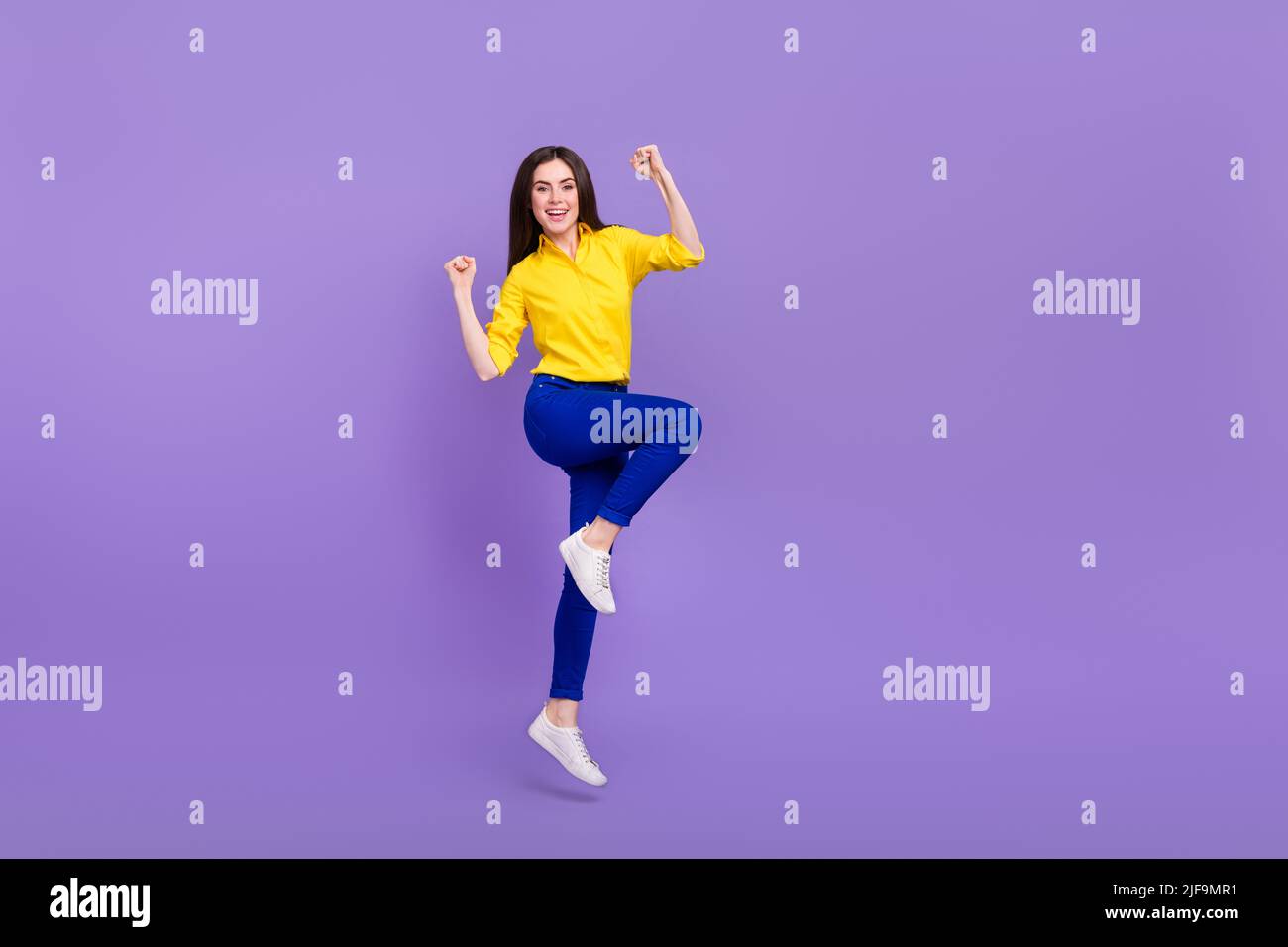 Full length body size view of attractive cheery girl jumping rejoicing ...