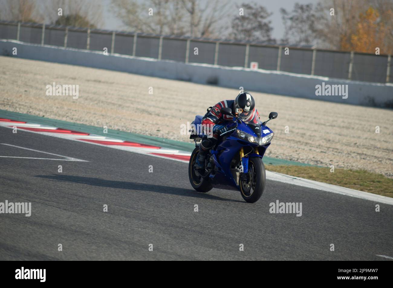 Modern fast sport motor bike in the track. Yamaha R1 Stock Photo - Alamy