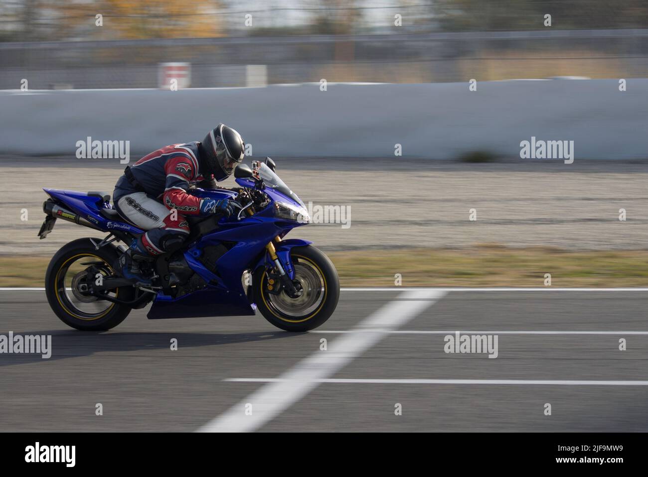 Modern fast sport motor bike in the track. Yamaha R1 Stock Photo - Alamy